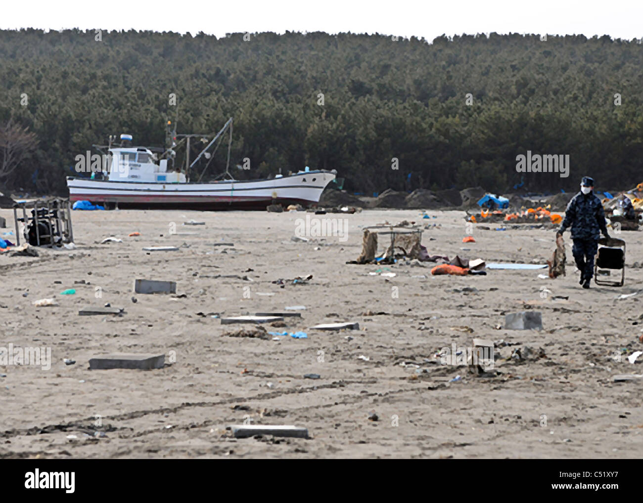 Liquefaction earthquake cleaning hi-res stock photography and images ...