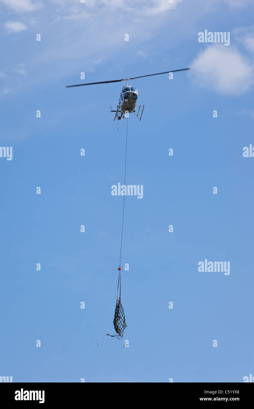 helicopter with cargo net Stock Photo - Alamy