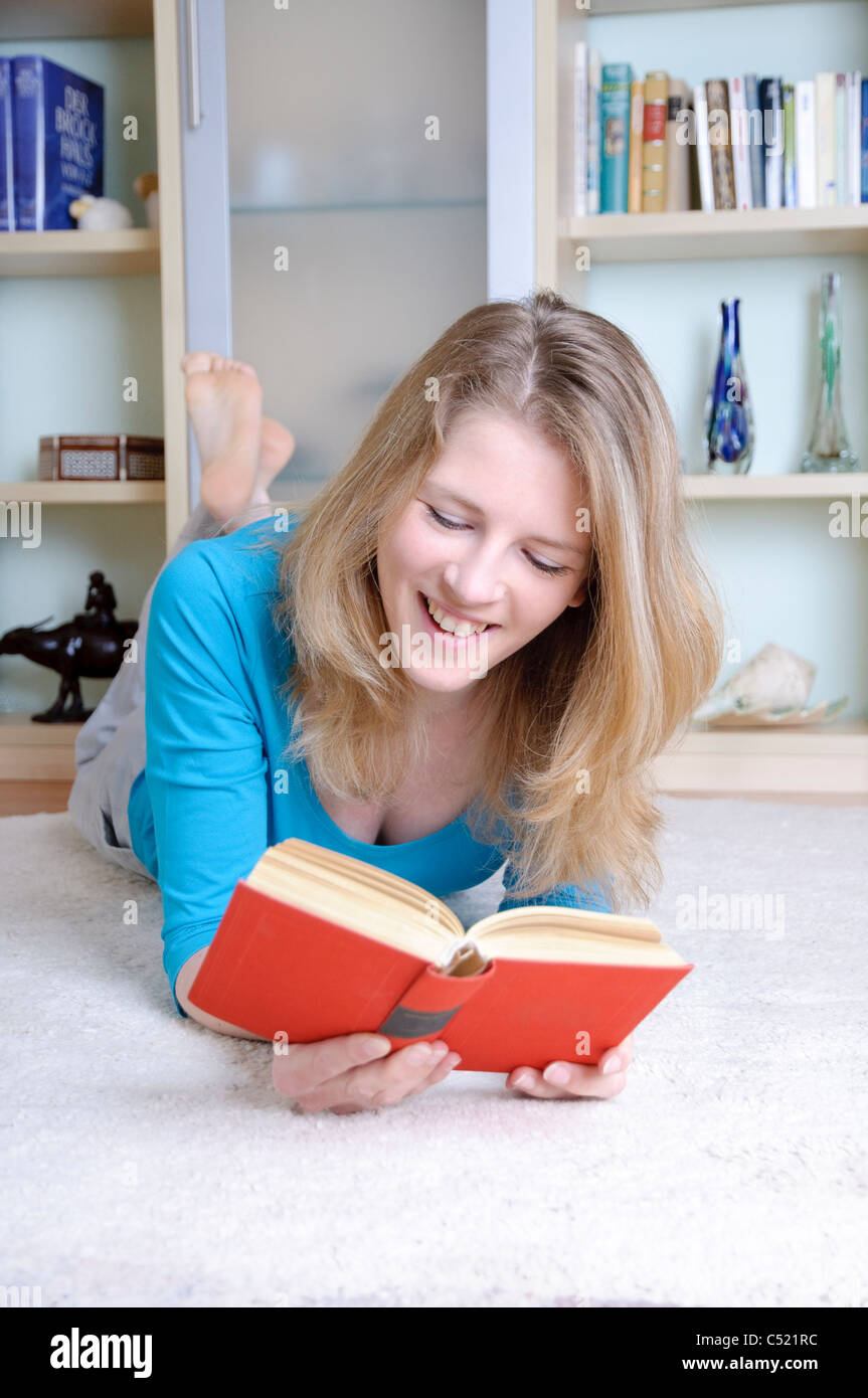 Woman lies on floor hi-res stock photography and images - Alamy