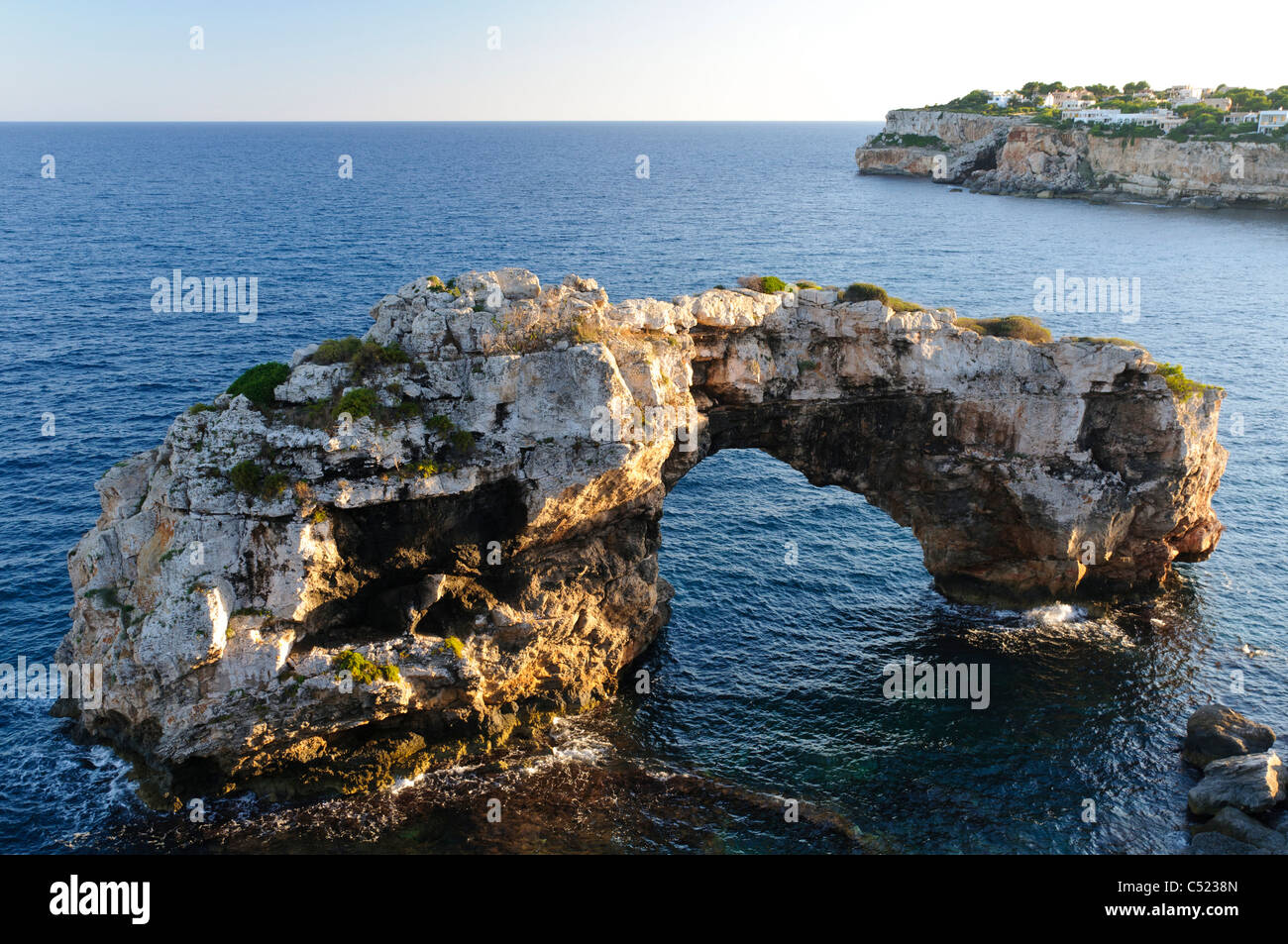 Es Pontas, a natural rock arch off the coast of Cala Santanyi, Majorca ...