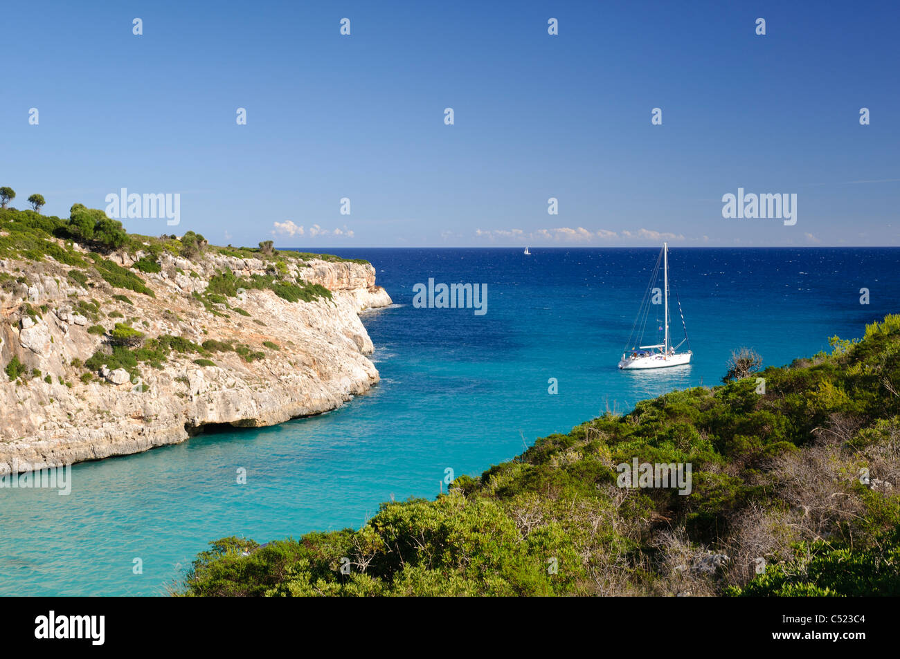 Yacht in the bay of Cala Magraner, Majorca, Balearic Islands, Spain ...