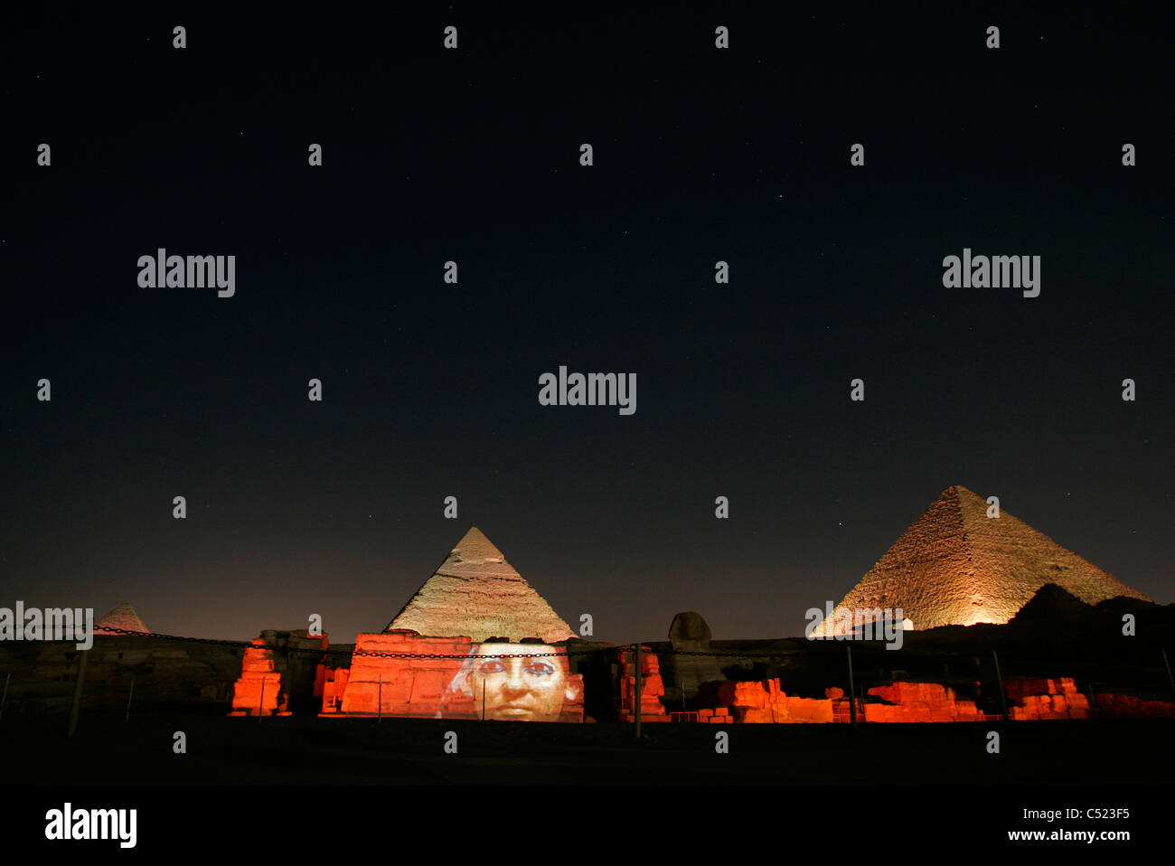 The Great Pyramids floodlit at night during the Sound and Light show ...