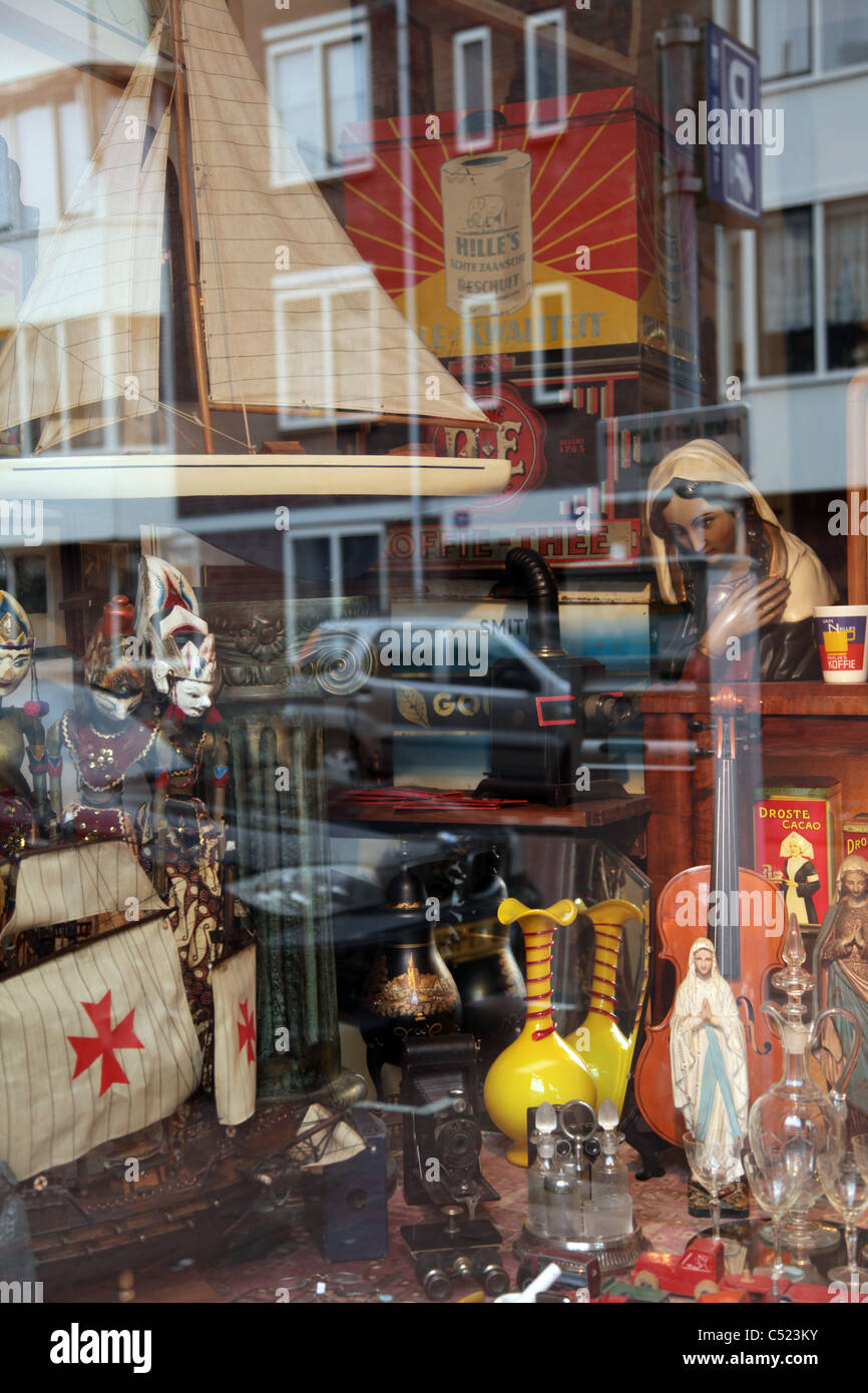 Reflection of street in shop window in Haarlem Stock Photo - Alamy
