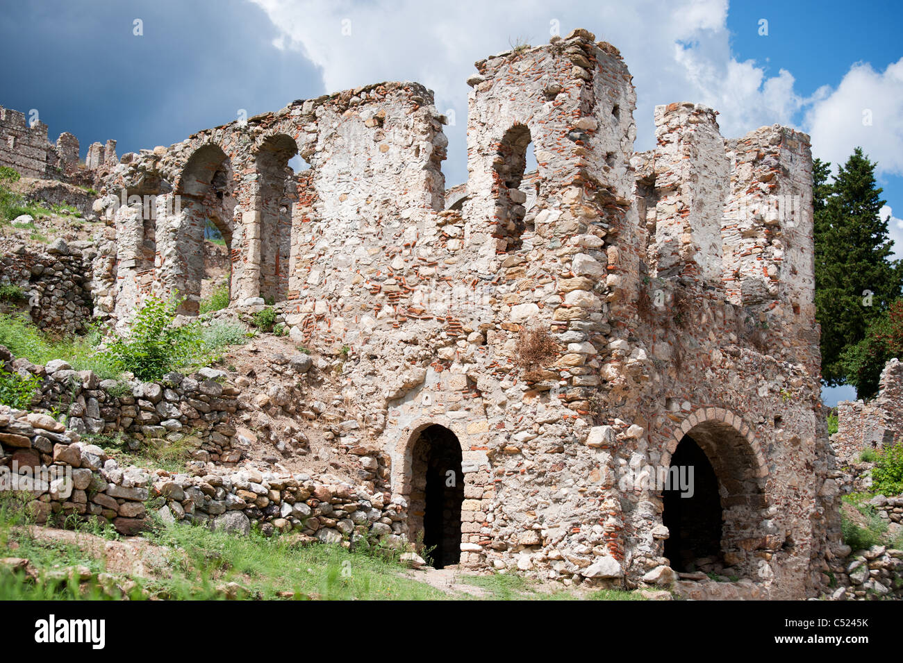 Spooky old and damaged ruin with dark clouds Stock Photo - Alamy