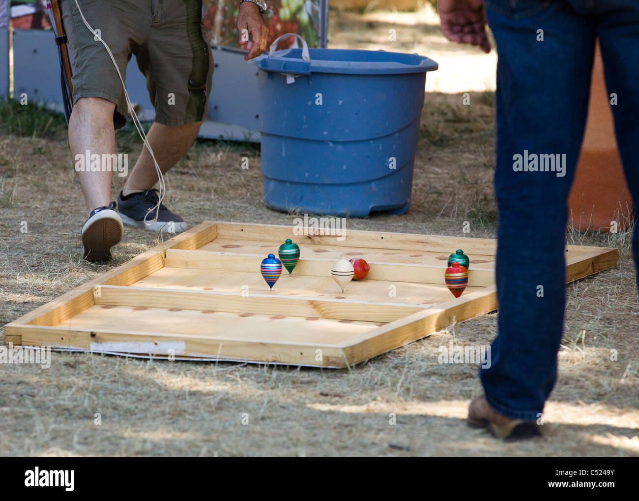 Tops spinning hi-res stock photography and images - Alamy