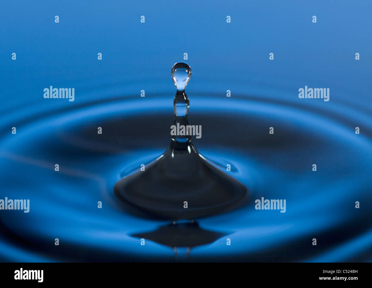 Alien looking water splash from dripping water using high speed flash ...