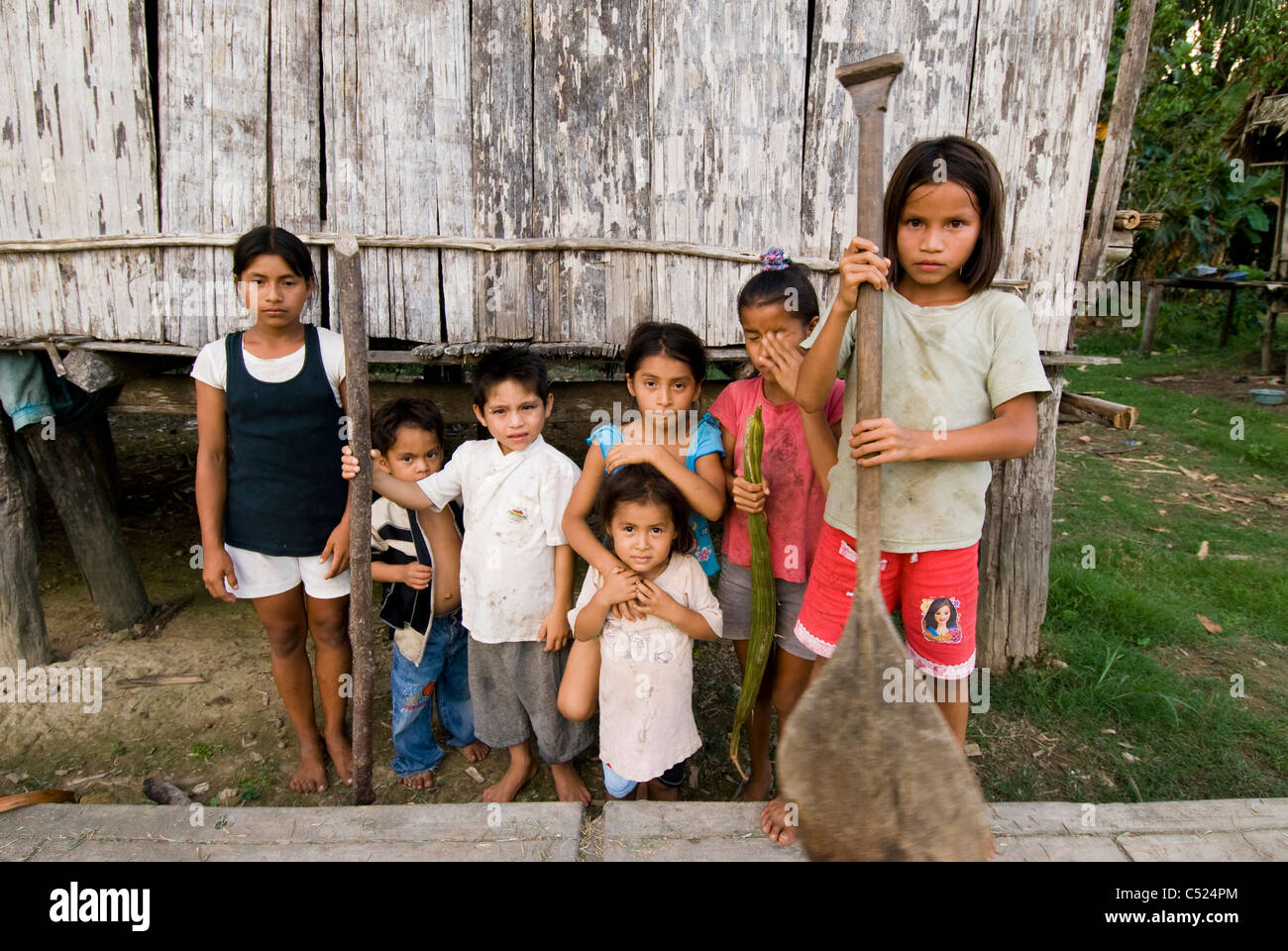 Indigenous "river people" children posing in small village on Rio El ...