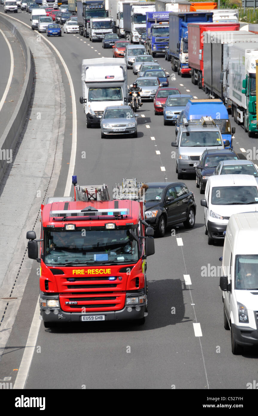 View from above looking down on busy M25 motorway with cars lorries ...