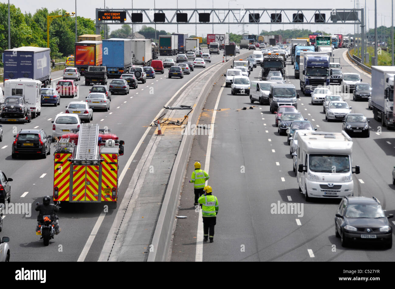 View from above looking down on busy M25 motorway traffic jam emergency ...