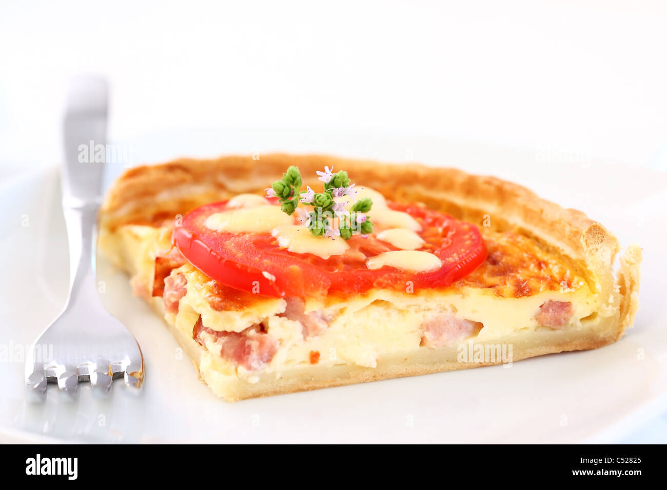 Tradition French bacon quiche with onion, tomato and cheese Stock Photo ...