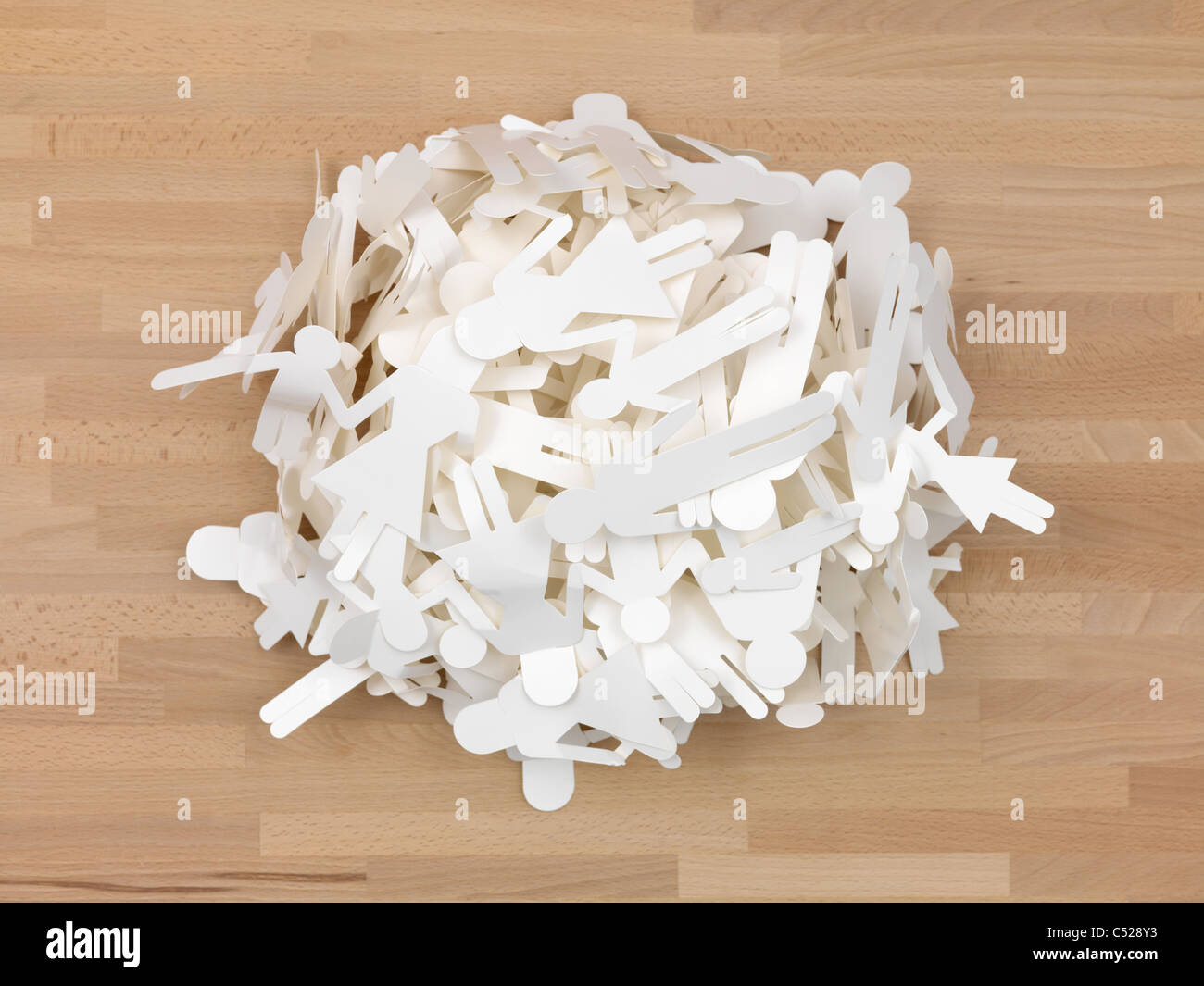 An image of craft people cutouts piled up together Stock Photo - Alamy