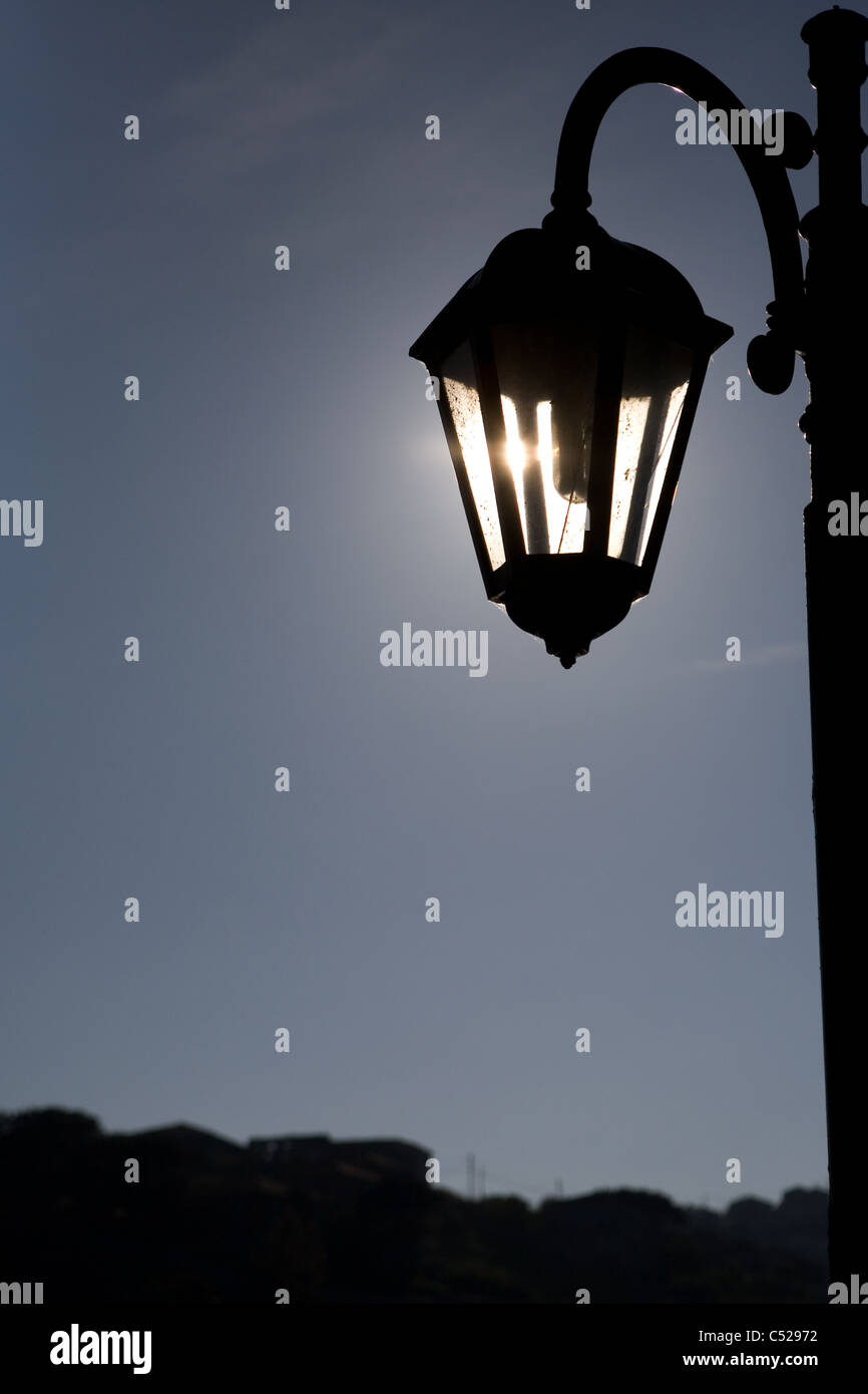 streetlight in early morning sun Stock Photo - Alamy