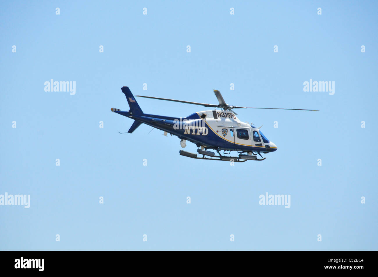 Police Helicopter flying over Rockaway Beach Stock Photo - Alamy