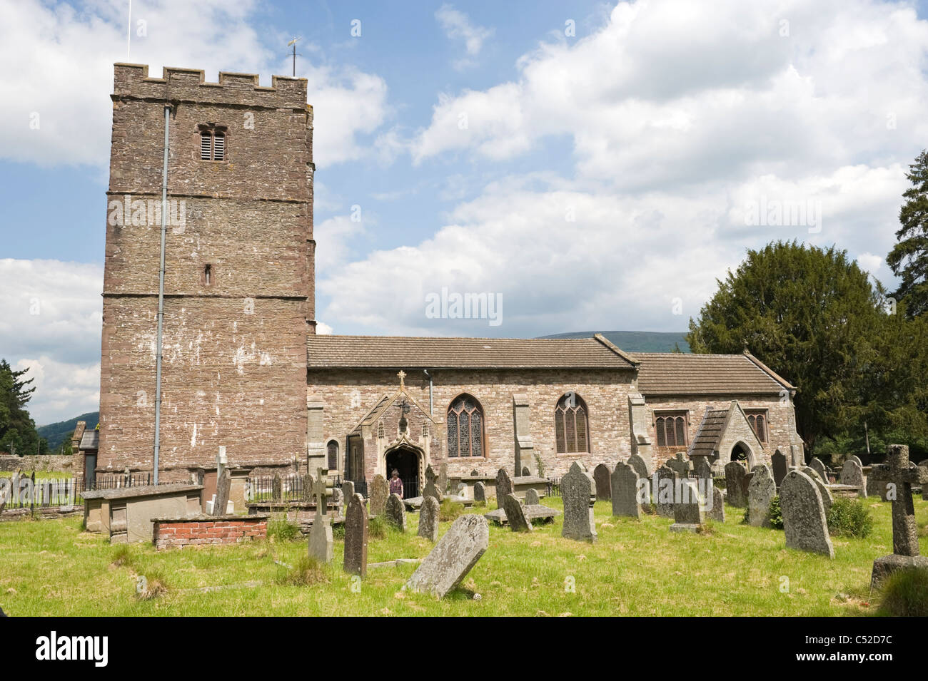 Exterior of St Catwg's church and graveyard in rural village of ...