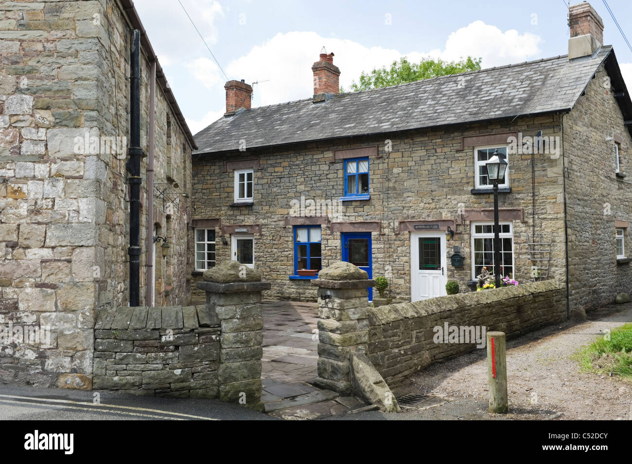 Traditional Victorian terraced cottages in courtyard setting in village ...