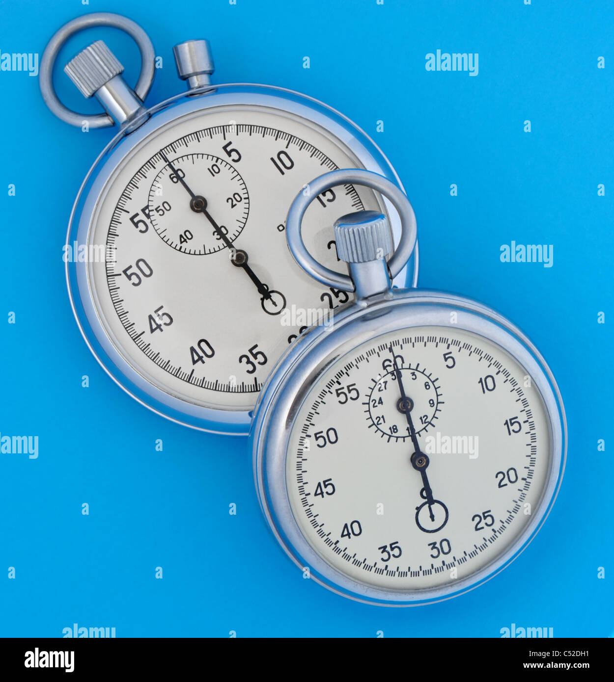 Two stopwatch on blue.The device for time gauging Stock Photo - Alamy