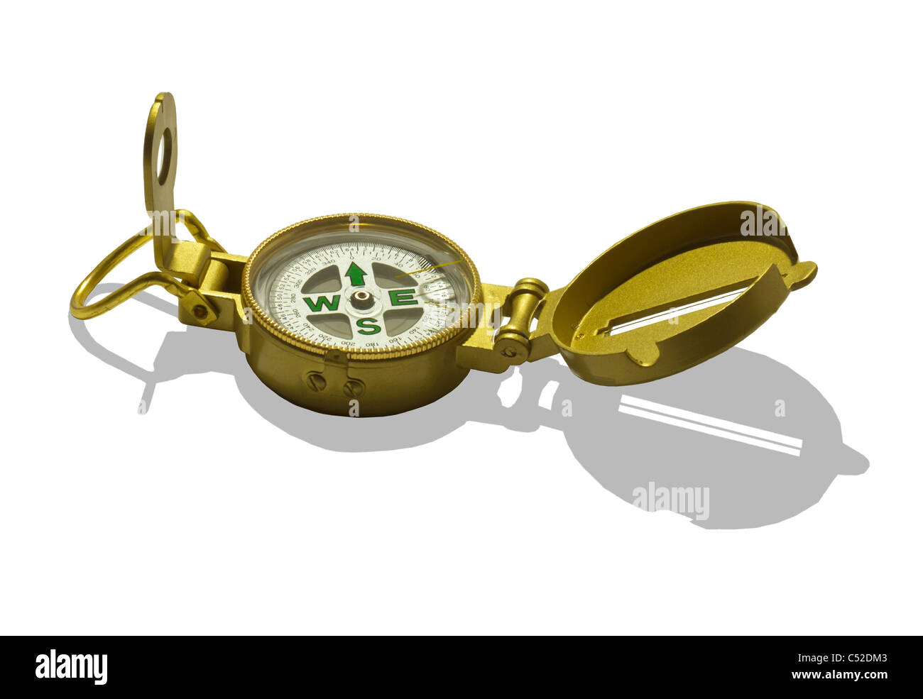 Old gold compass opened isolated on white background Stock Photo - Alamy