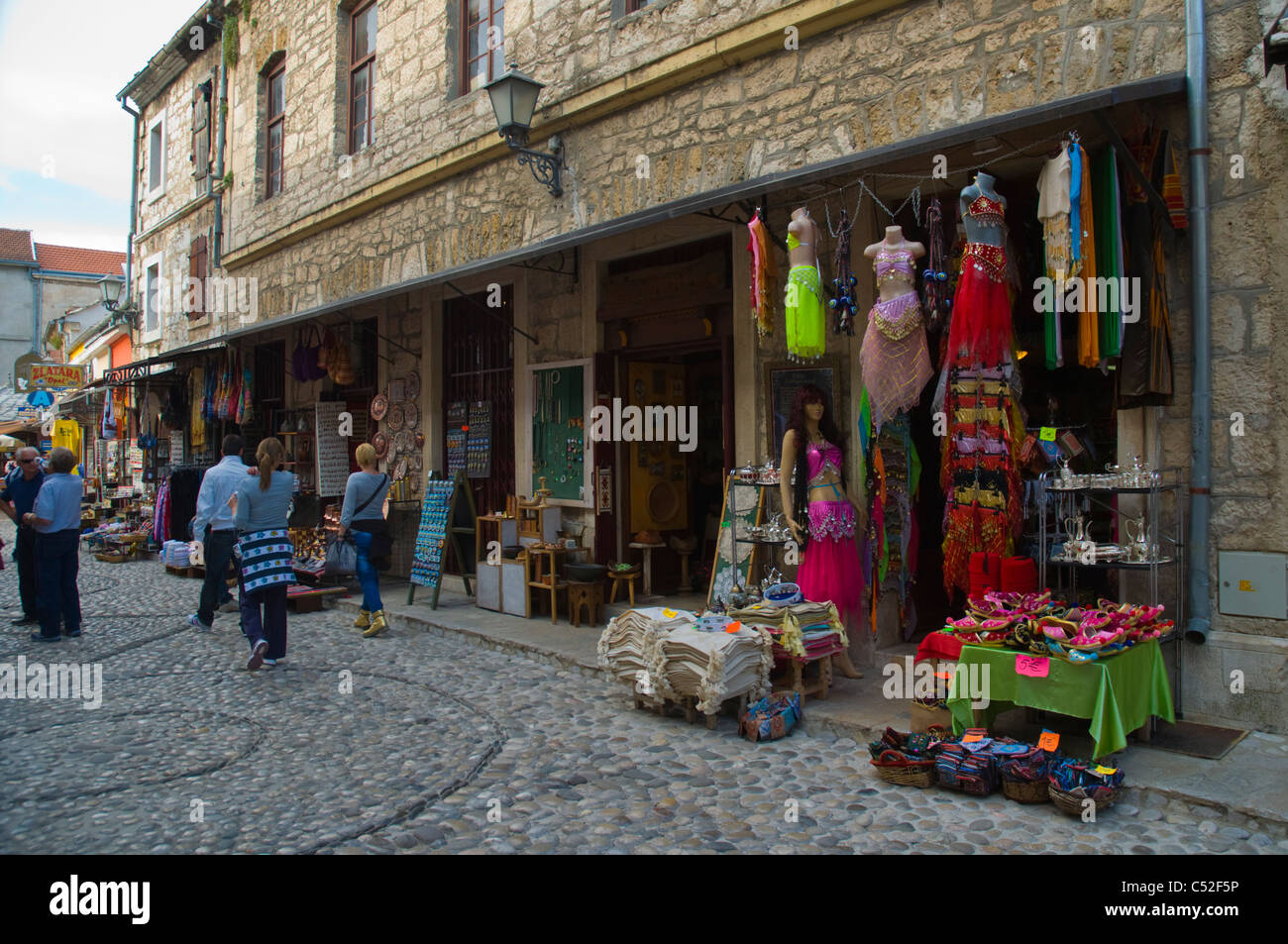 Souvenir shops Kujundziluk main pedestrian street Mostar city Bosnia ...