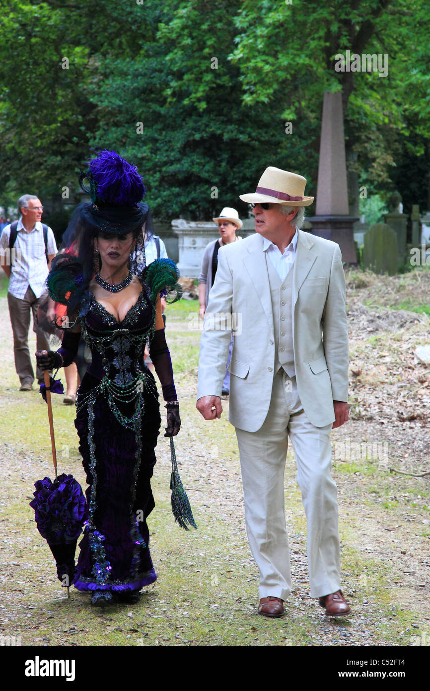 People dressed in victorian mourning clothes at Kensal Green cemetery ...