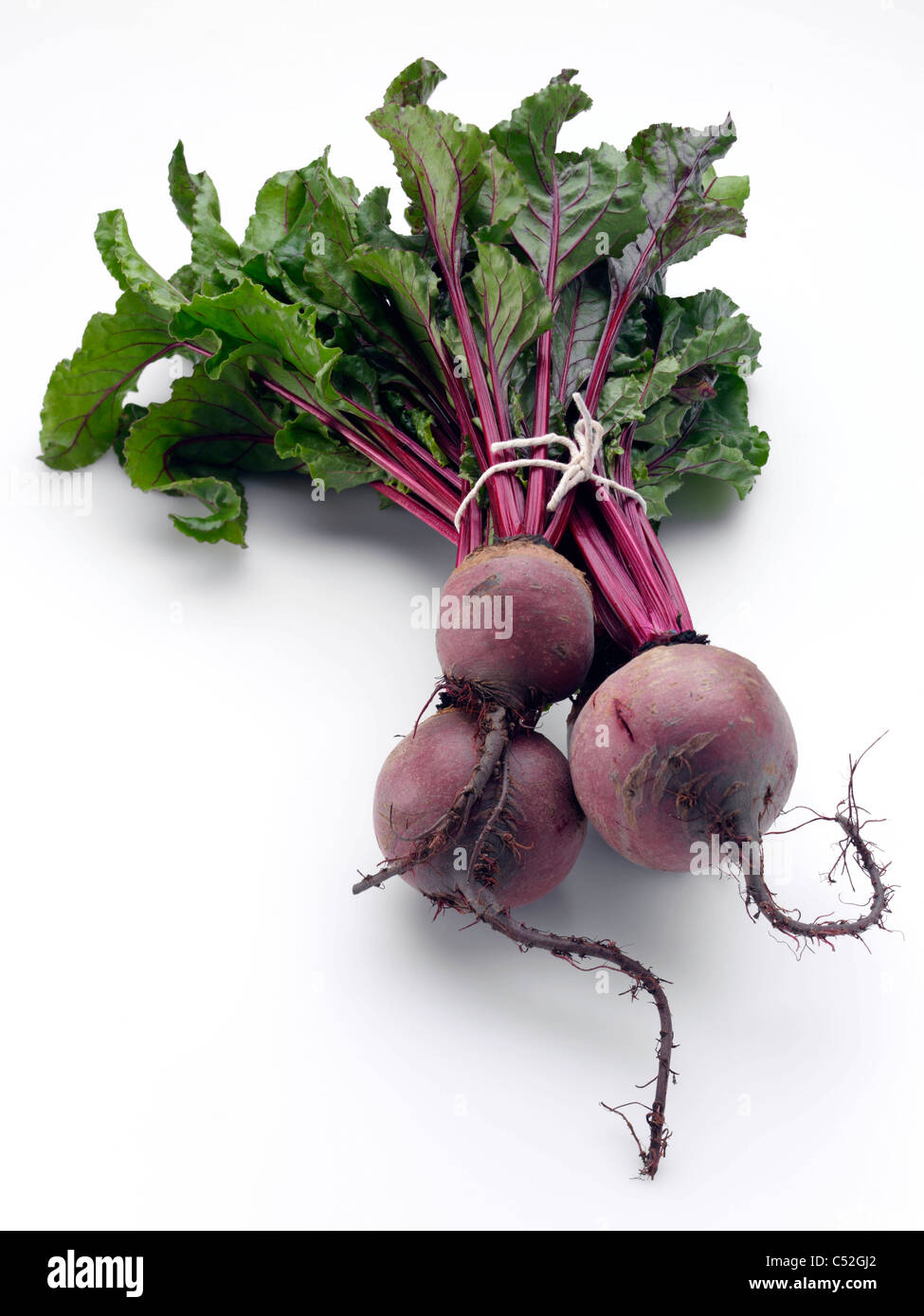 Fresh beetroot with leaves on a white background Stock Photo - Alamy