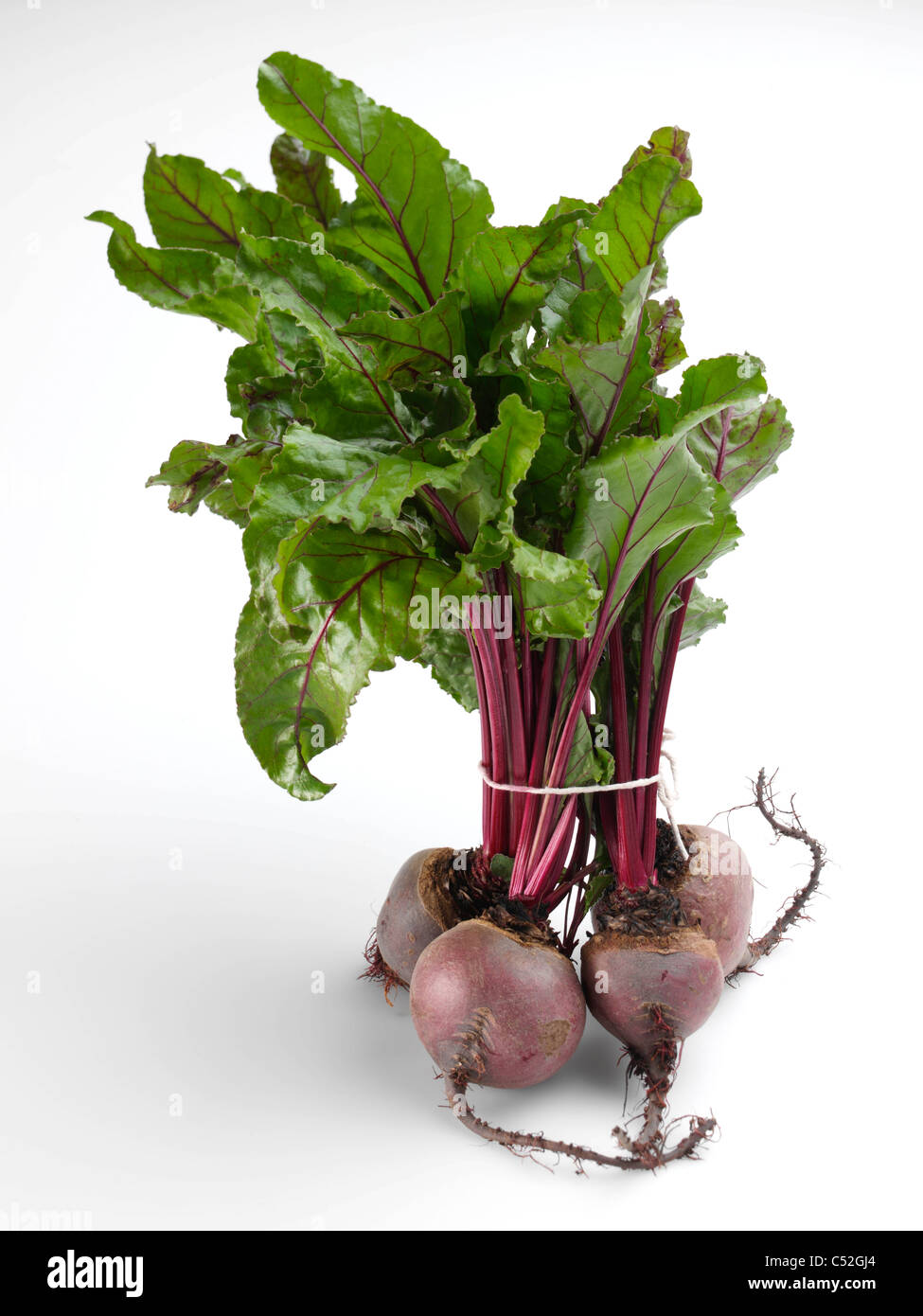 Fresh beetroot with leaves on a white background Stock Photo - Alamy