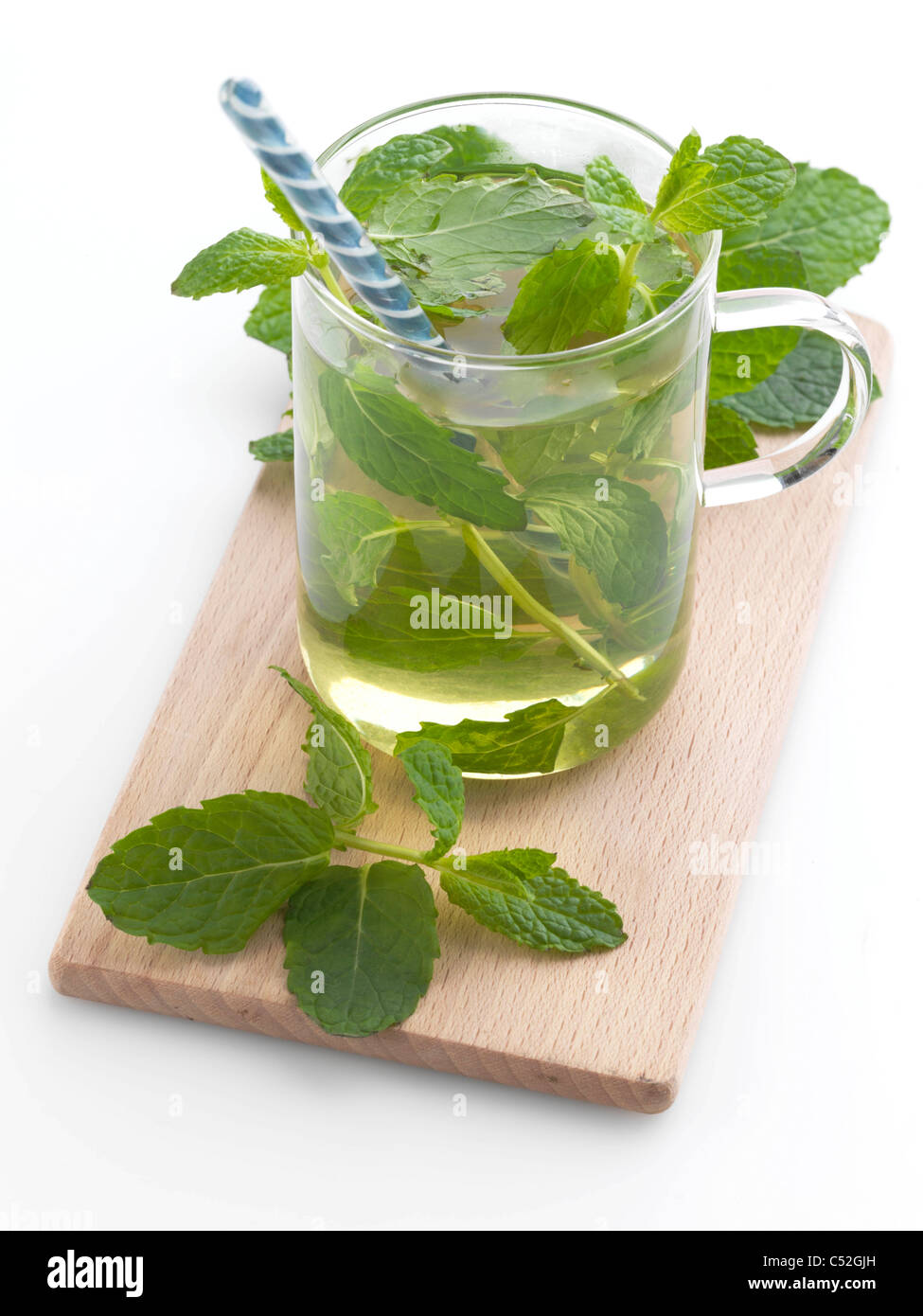 A glass mug of hot mint tea Stock Photo - Alamy