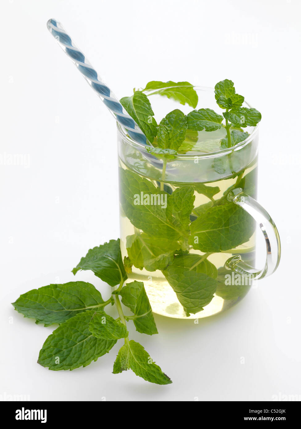 A glass mug of hot mint tea Stock Photo - Alamy