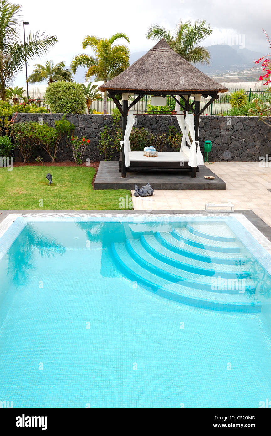 Bali type hut and swimming pool at luxury villa, Tenerife island, Spain ...