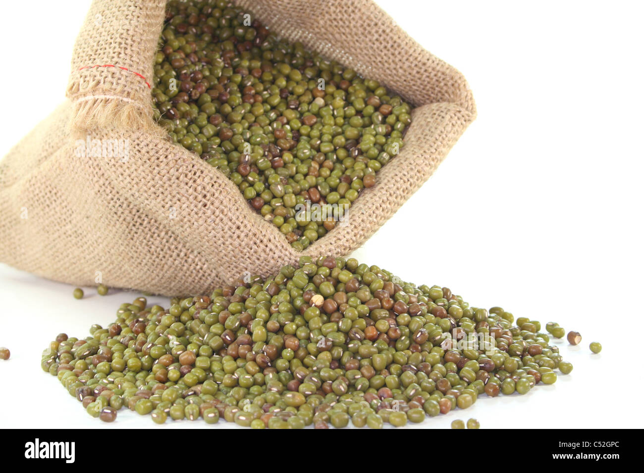 a sack of mungo beans on white background Stock Photo - Alamy