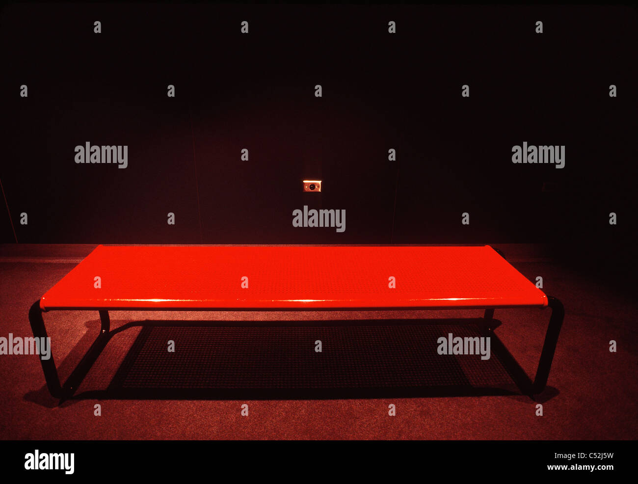 Red bench in corporate setting Stock Photo - Alamy