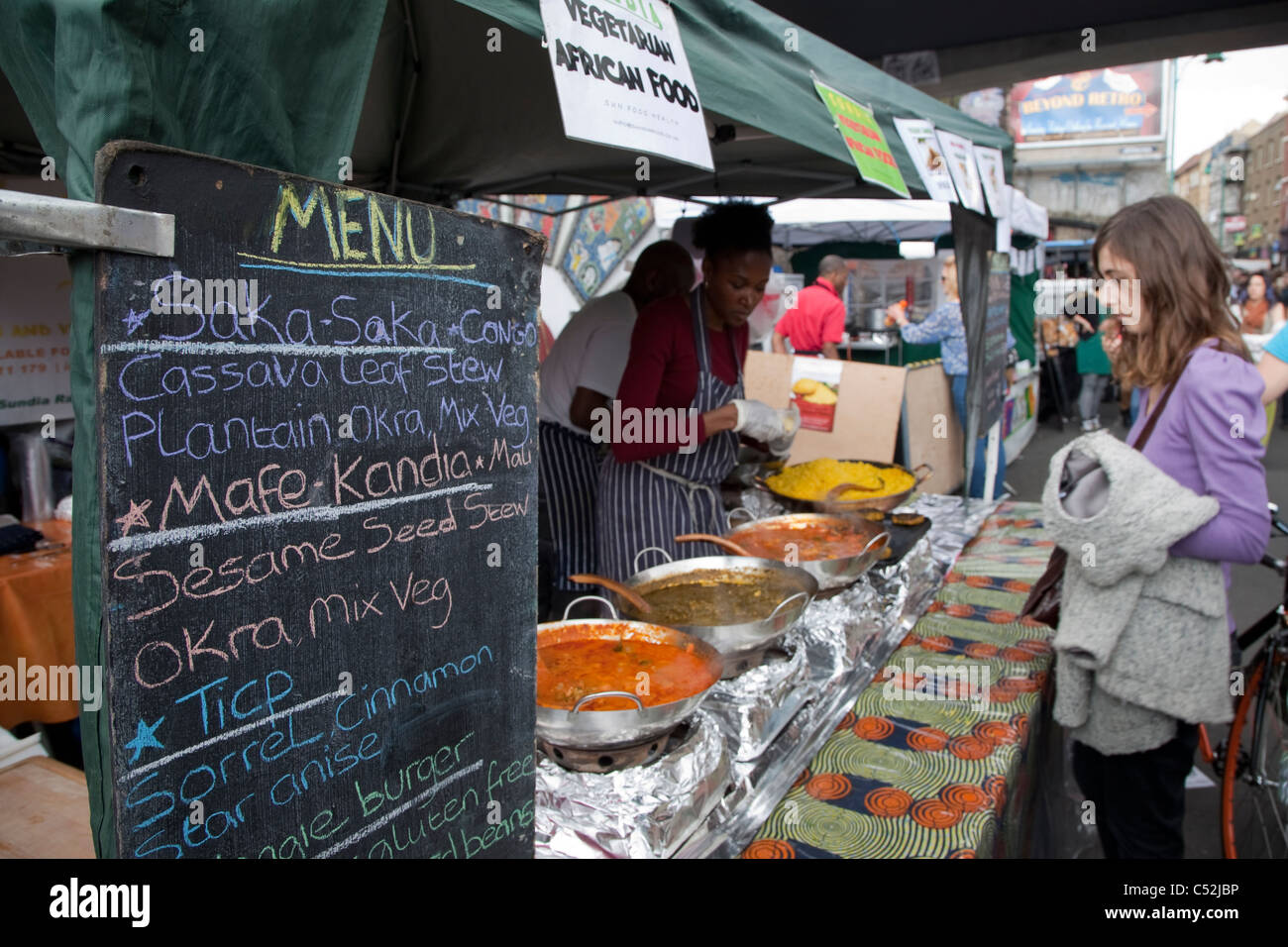Customer at the African Vegetarian Food Stall at the Sunday Up Market ...