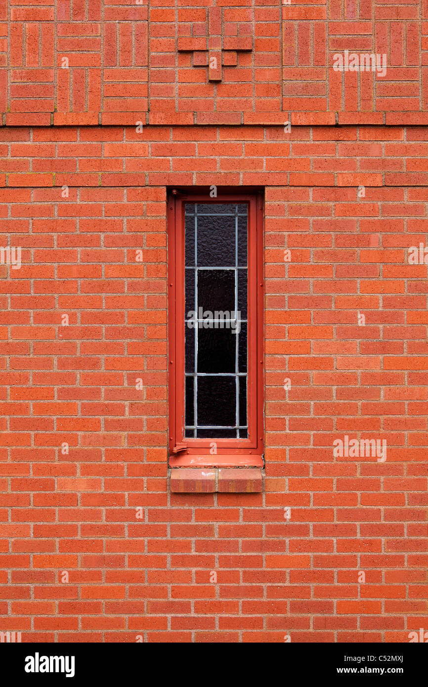 Single narrow leaded window in a red brick wall church Stock Photo - Alamy