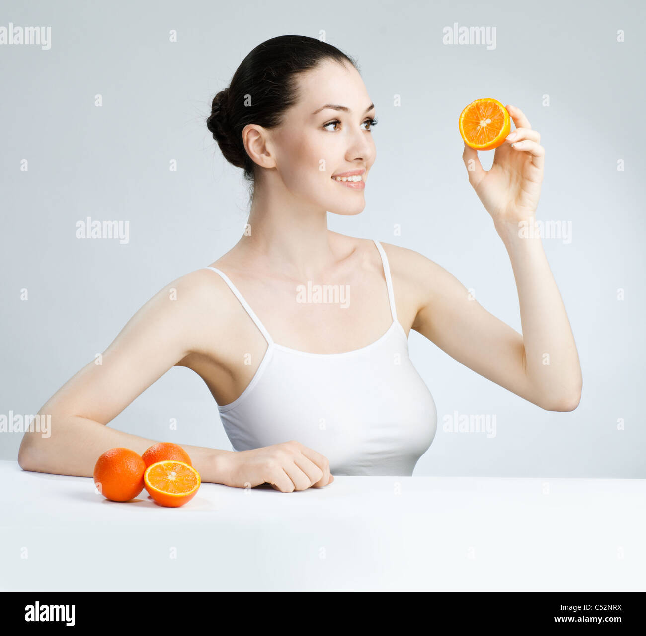 A beautiful slender girl eating healthy food Stock Photo - Alamy