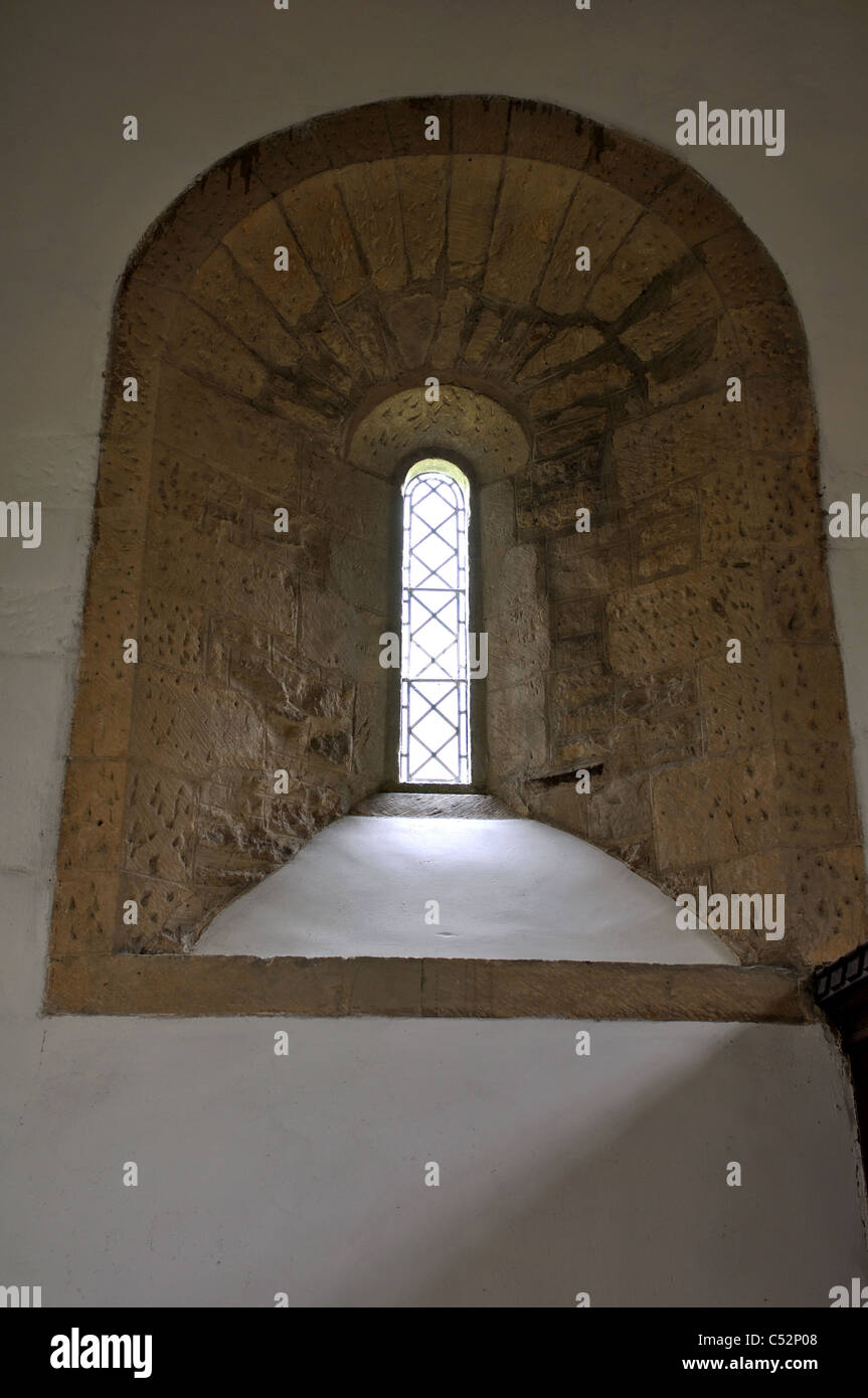 Norman window in St. Michael`s Church, Yanworth, Gloucestershire ...
