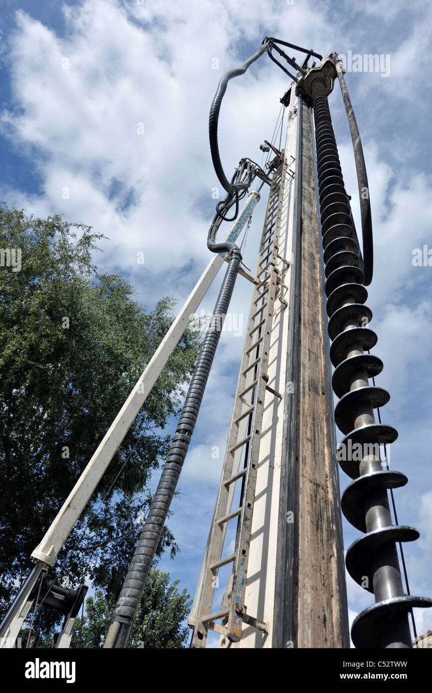 piling machine drilling foundation on building site Stock Photo - Alamy
