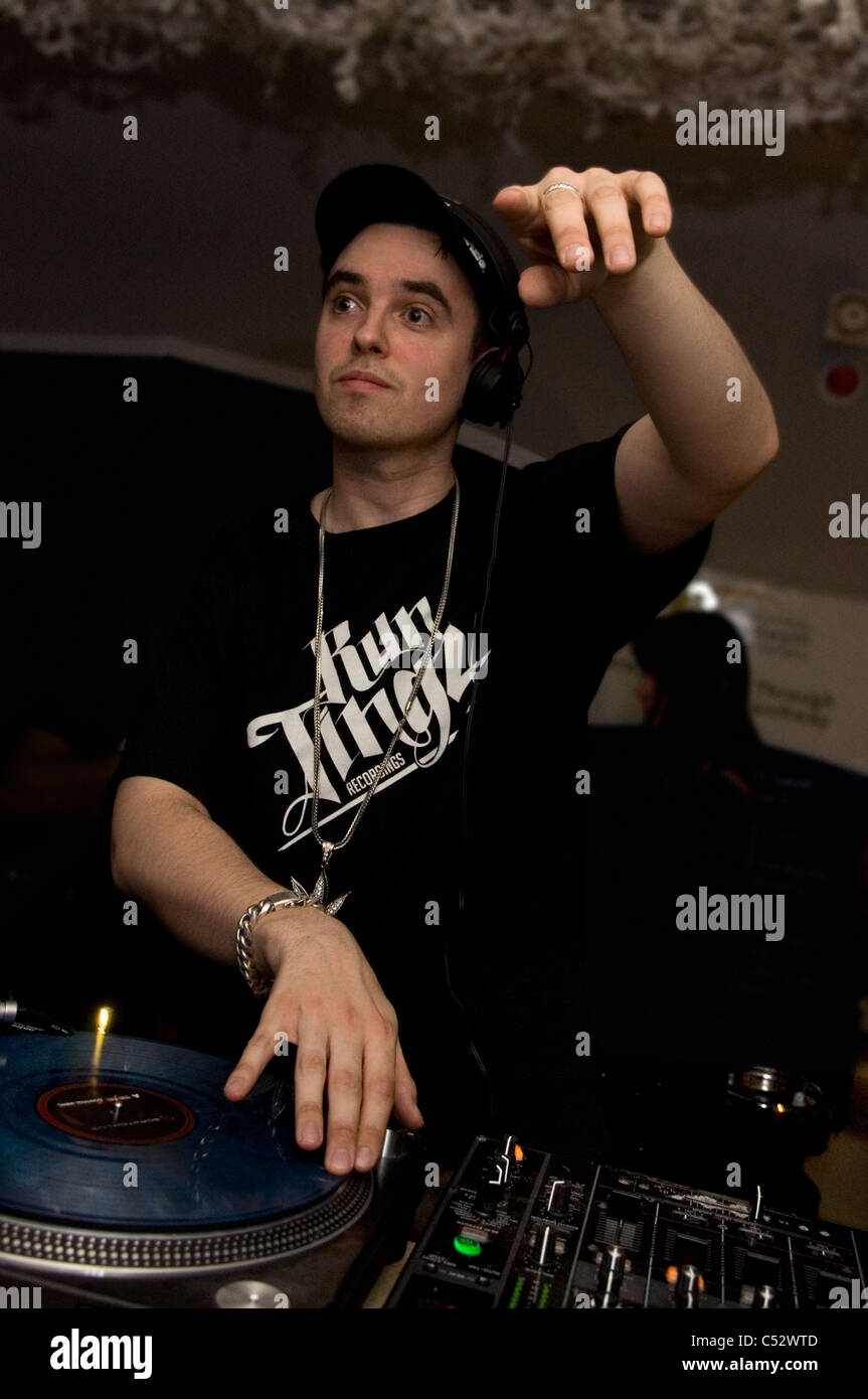 Run Tings playing a DJ set in the Art Center in Aberystwyth, mixing on ...