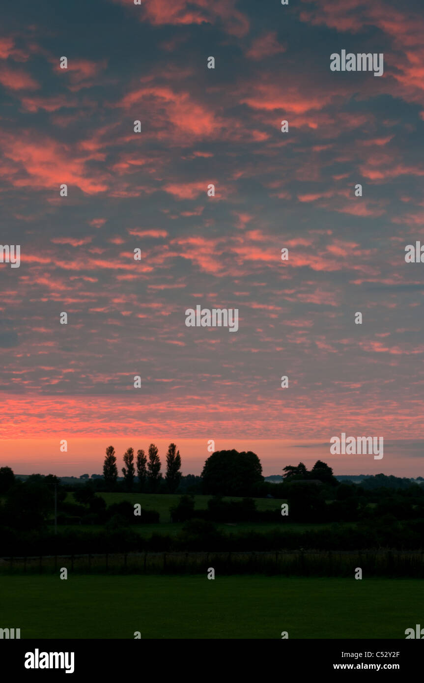 Sunrise over English countryside Stock Photo - Alamy
