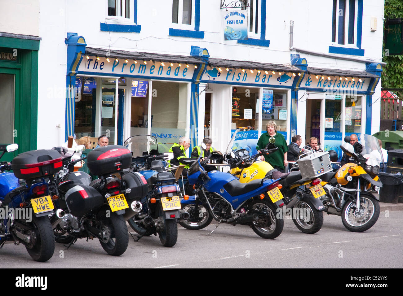 Motorcycles parked outside Fish Restaurant, Matlock Bath Stock Photo ...