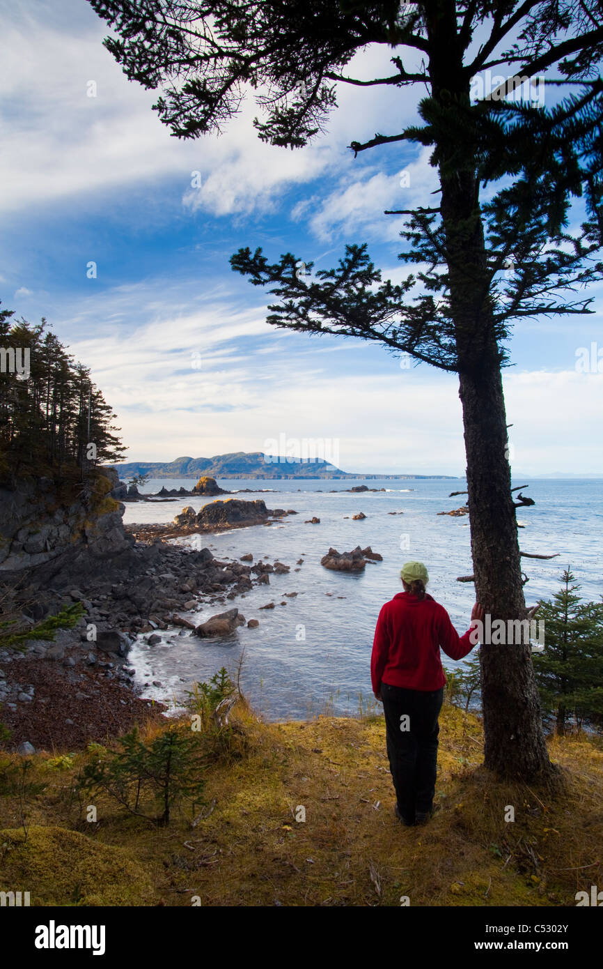 Female hiker enjoying the view overlooking Chiniak Bay at Fort ...