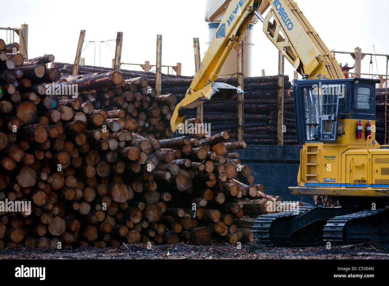 Log ship being loaded with Sitka Spruce from Chiniak and Sequel Point ...