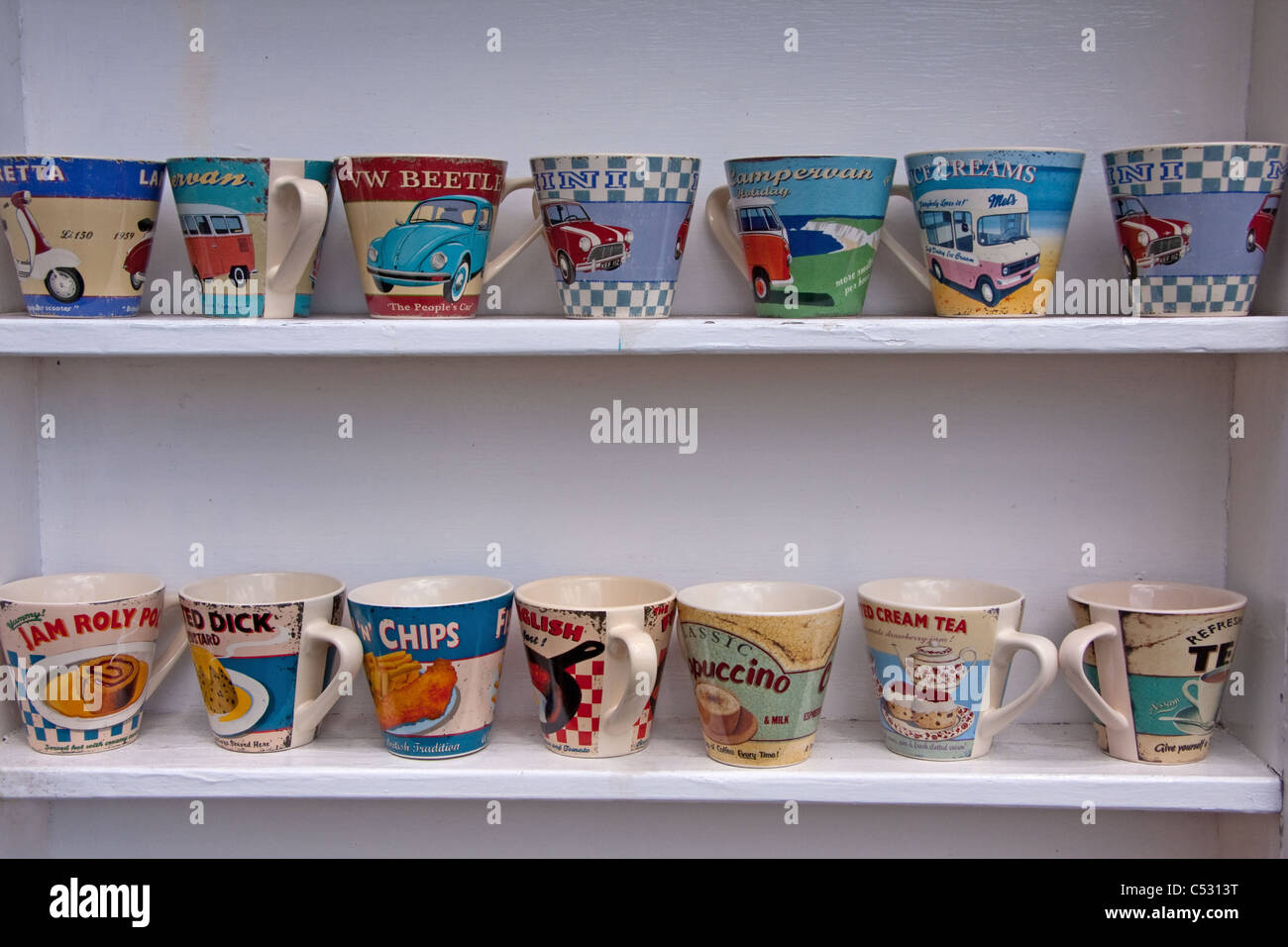 Old fashioned mugs in shop window Stock Photo - Alamy