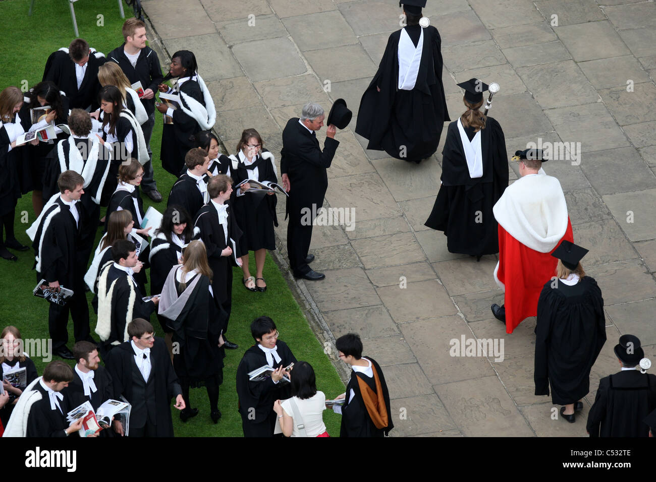 CAMBRIDGE UNIVERSITY STUDENTS GRADUATING AFTER PASSING THEIR EXAMS AND ...