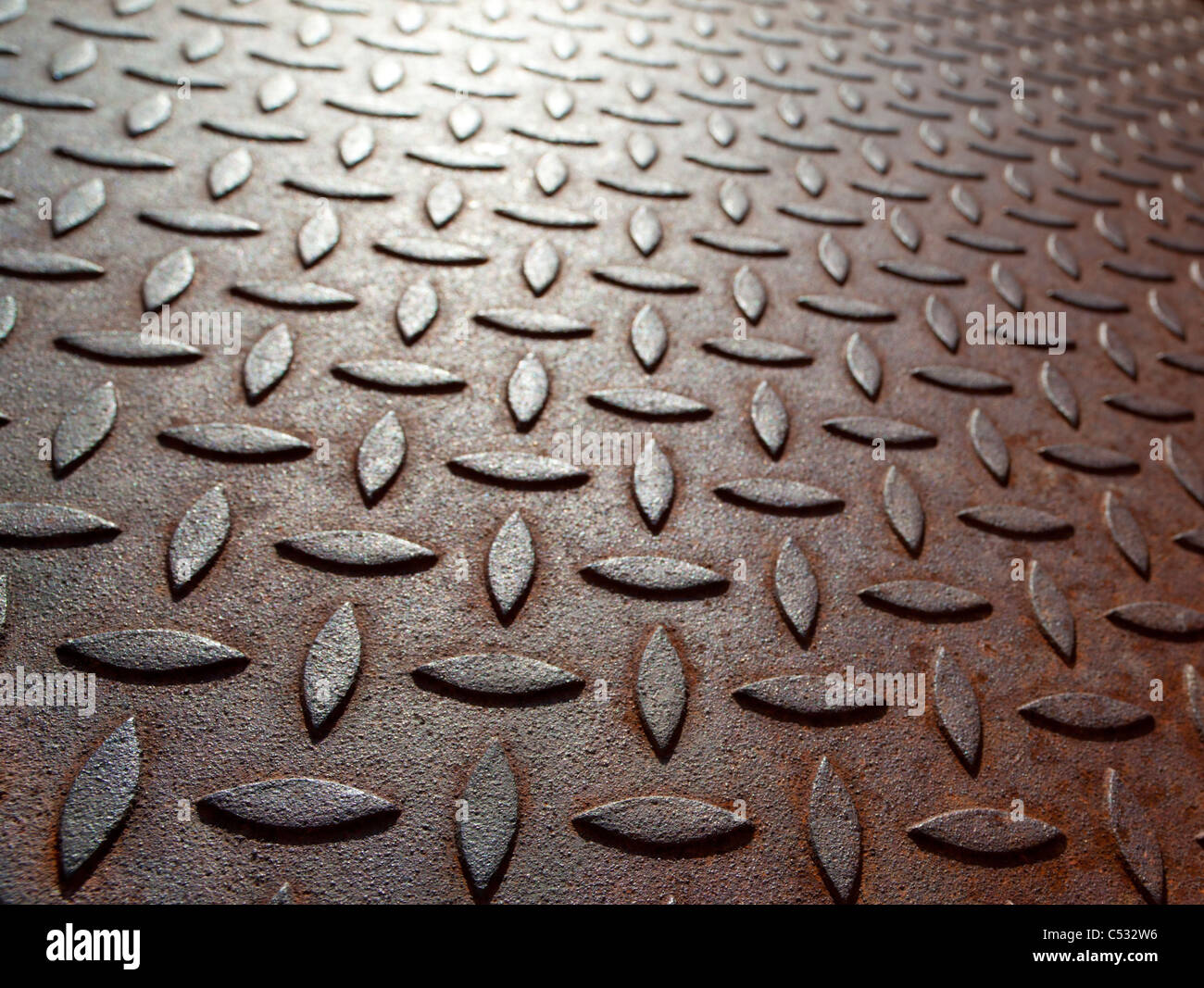 Surface of a rusty metal diamond plate Stock Photo - Alamy