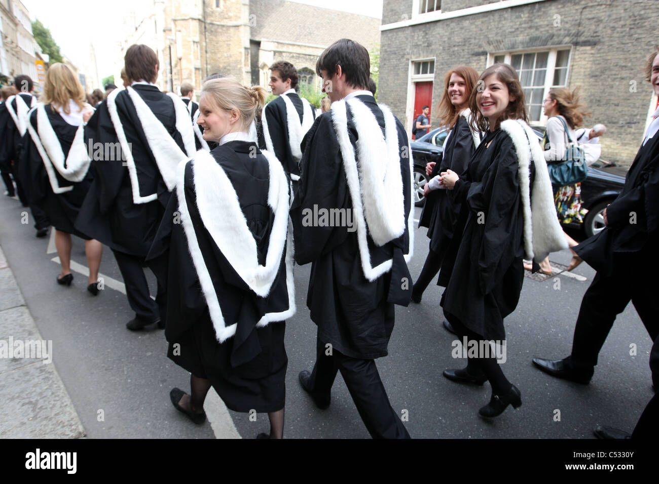 CAMBRIDGE UNIVERSITY STUDENTS GRADUATING AFTER PASSING THEIR EXAMS AND ...