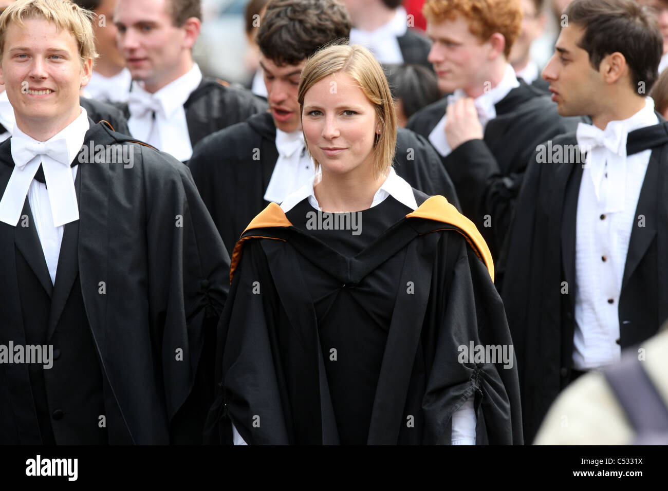 CAMBRIDGE UNIVERSITY STUDENTS GRADUATING AFTER PASSING THEIR EXAMS AND ...