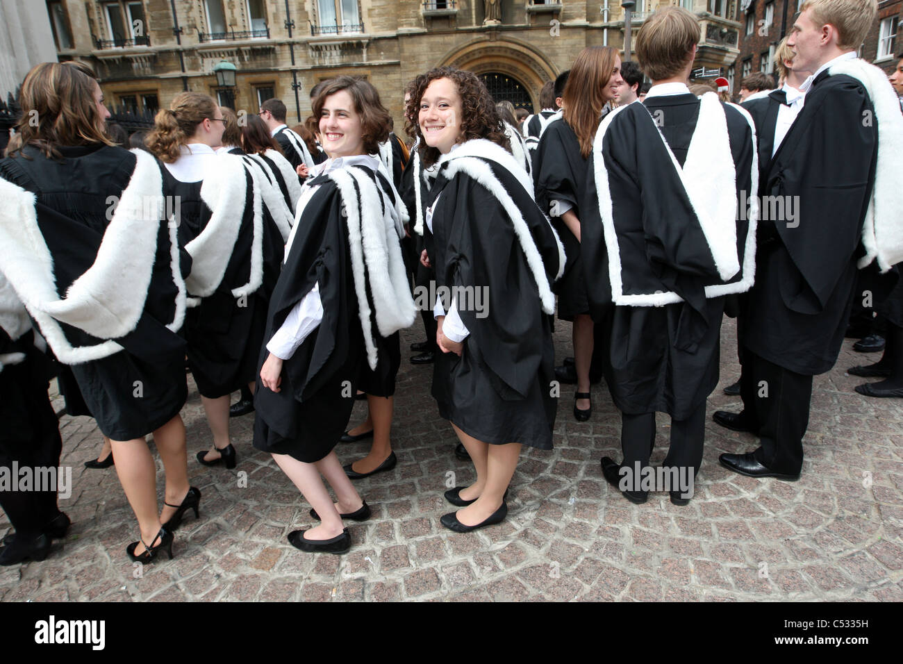 CAMBRIDGE UNIVERSITY STUDENTS GRADUATING AFTER PASSING THEIR EXAMS AND ...
