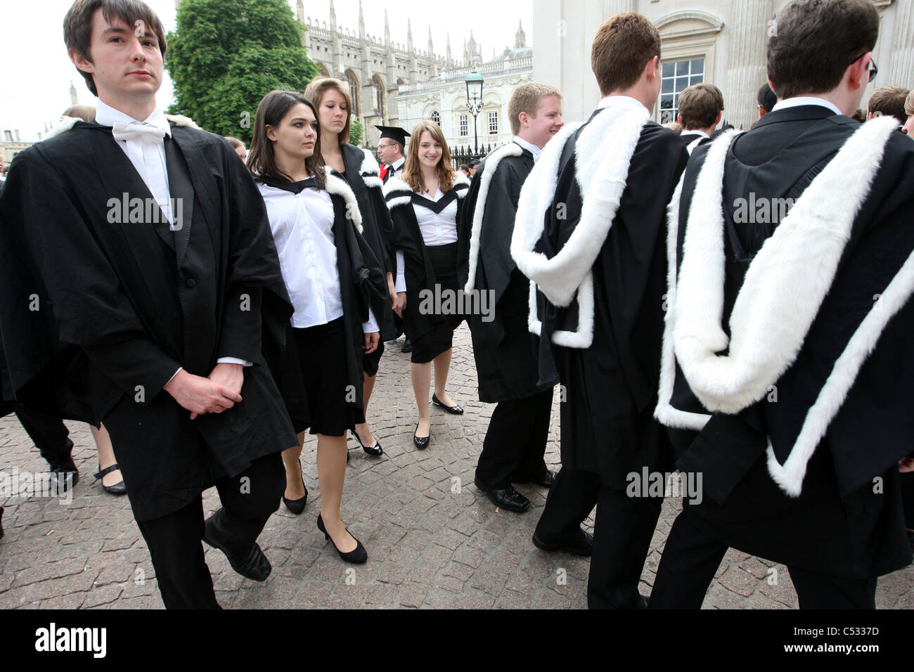 CAMBRIDGE UNIVERSITY STUDENTS GRADUATING AFTER PASSING THEIR EXAMS AND ...