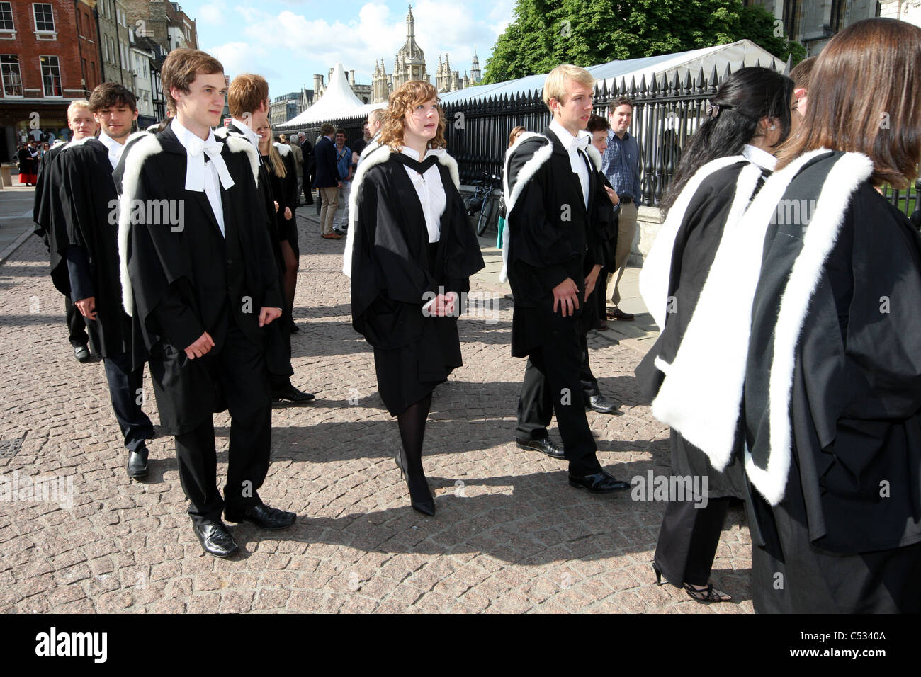 CAMBRIDGE UNIVERSITY STUDENTS GRADUATING AFTER PASSING THEIR EXAMS AND ...