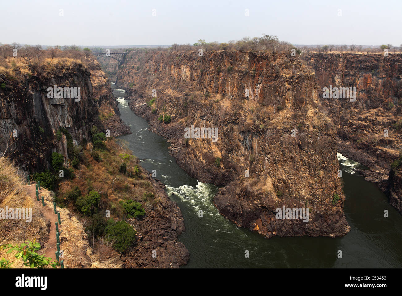 The rocky gorge created by the Zambezi River that forms the border ...