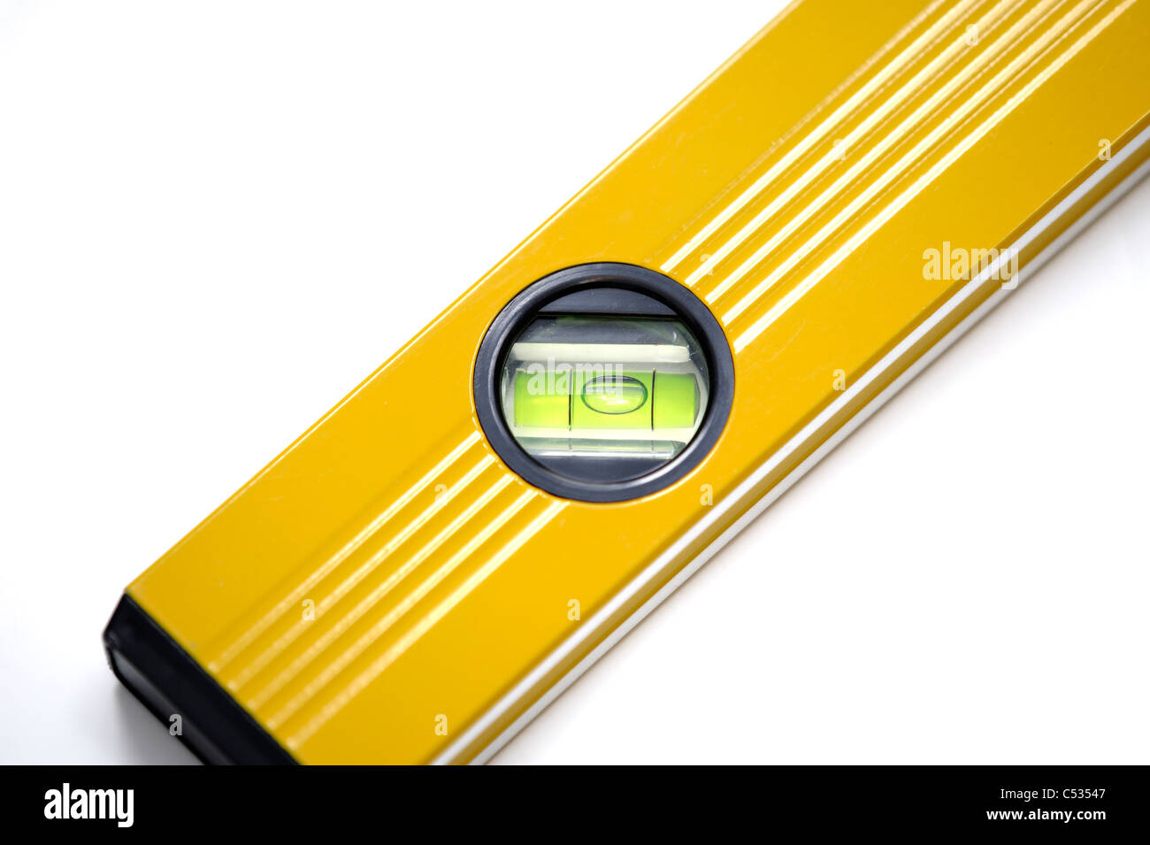 yellow builders spirit level england uk Stock Photo - Alamy